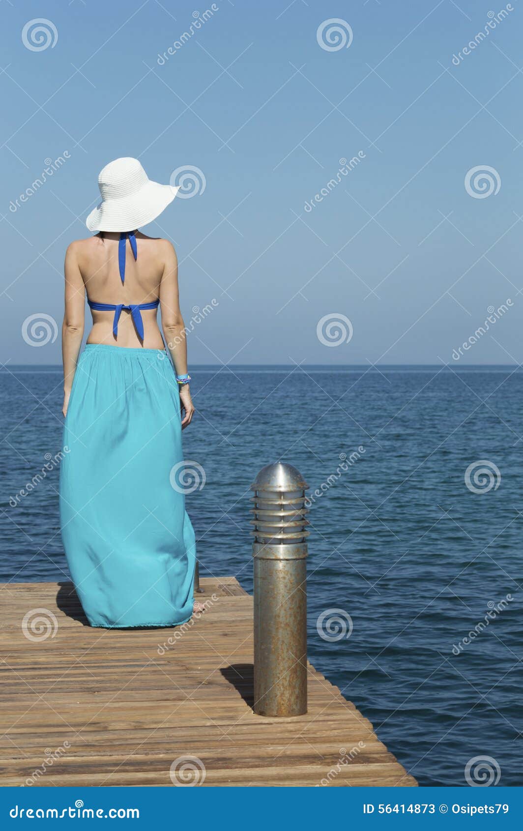 Woman Standing On A Pier And Looking Far Away Stock Image Image Of
