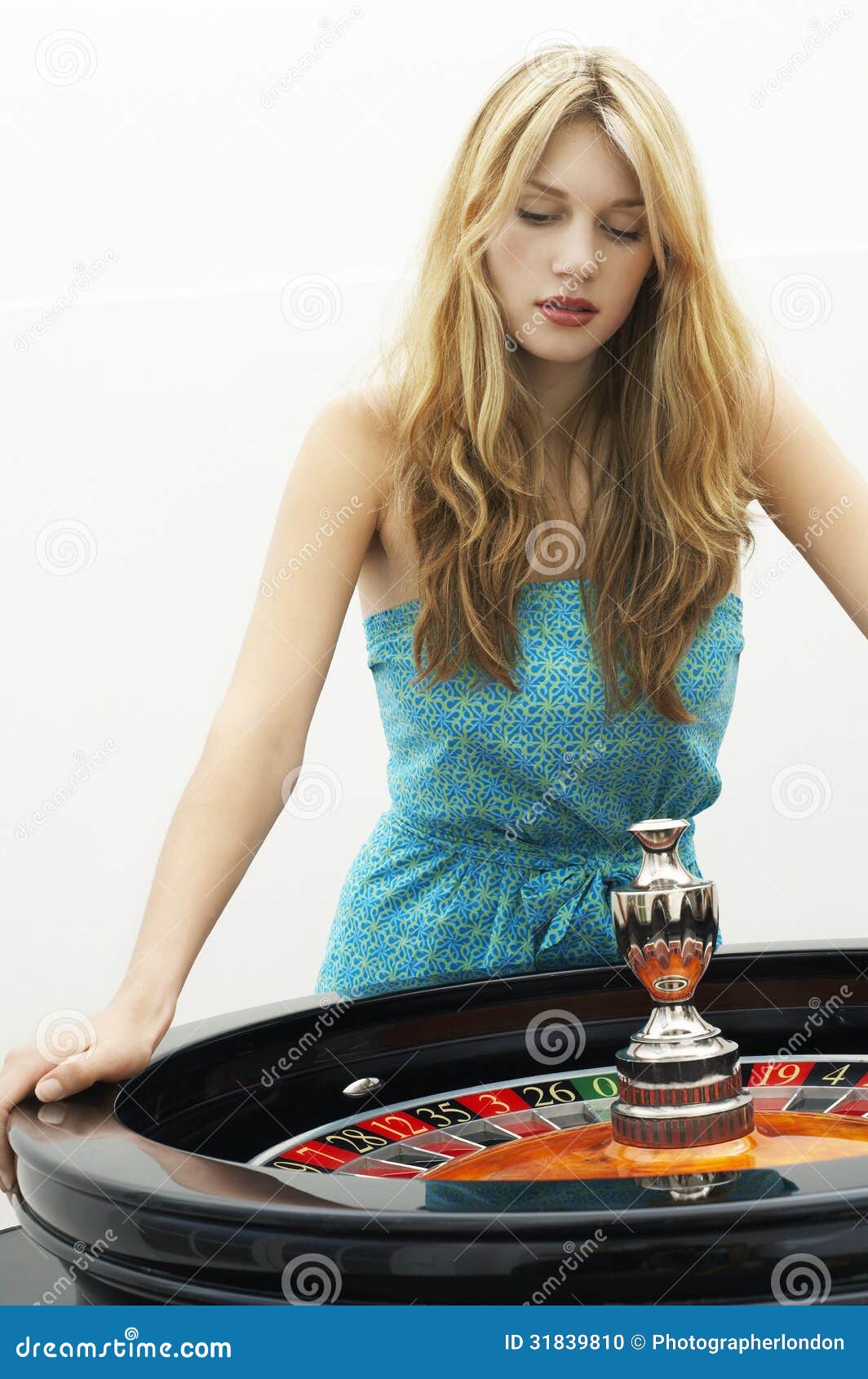 Woman Standing at Roulette Wheel Stock Photo - Image of indoors, chance ...