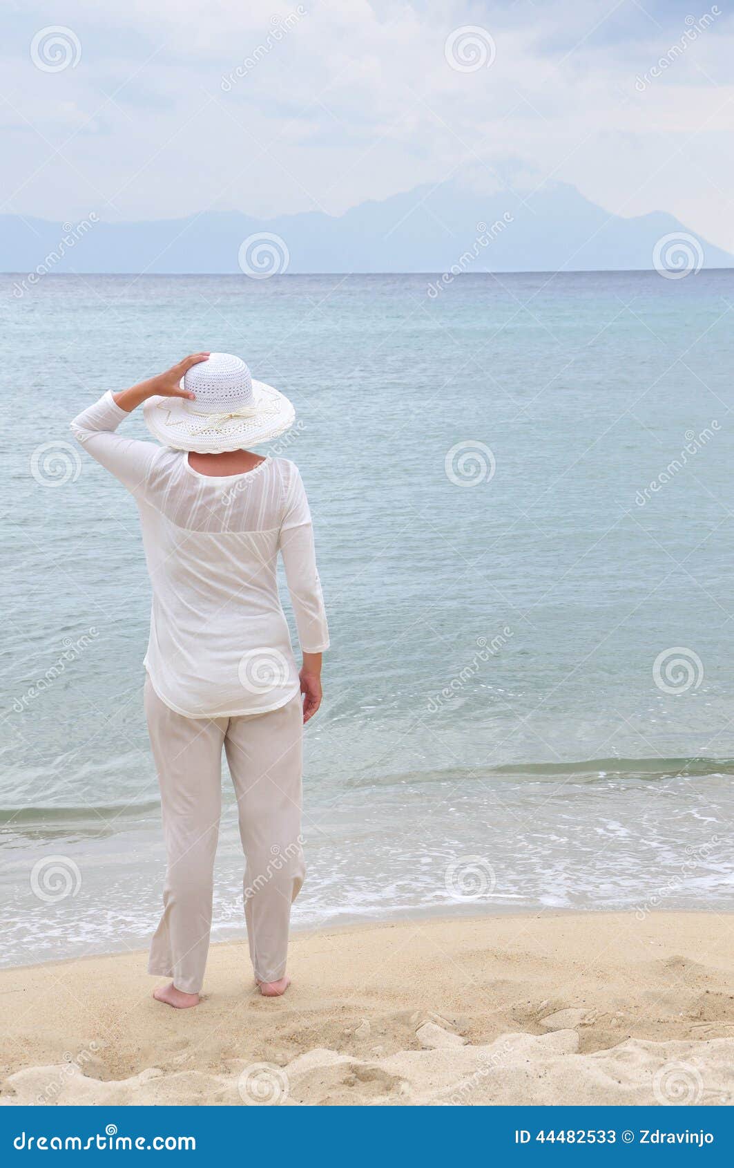 Woman Standing on the Sandy Beach Stock Image - Image of nature, person ...