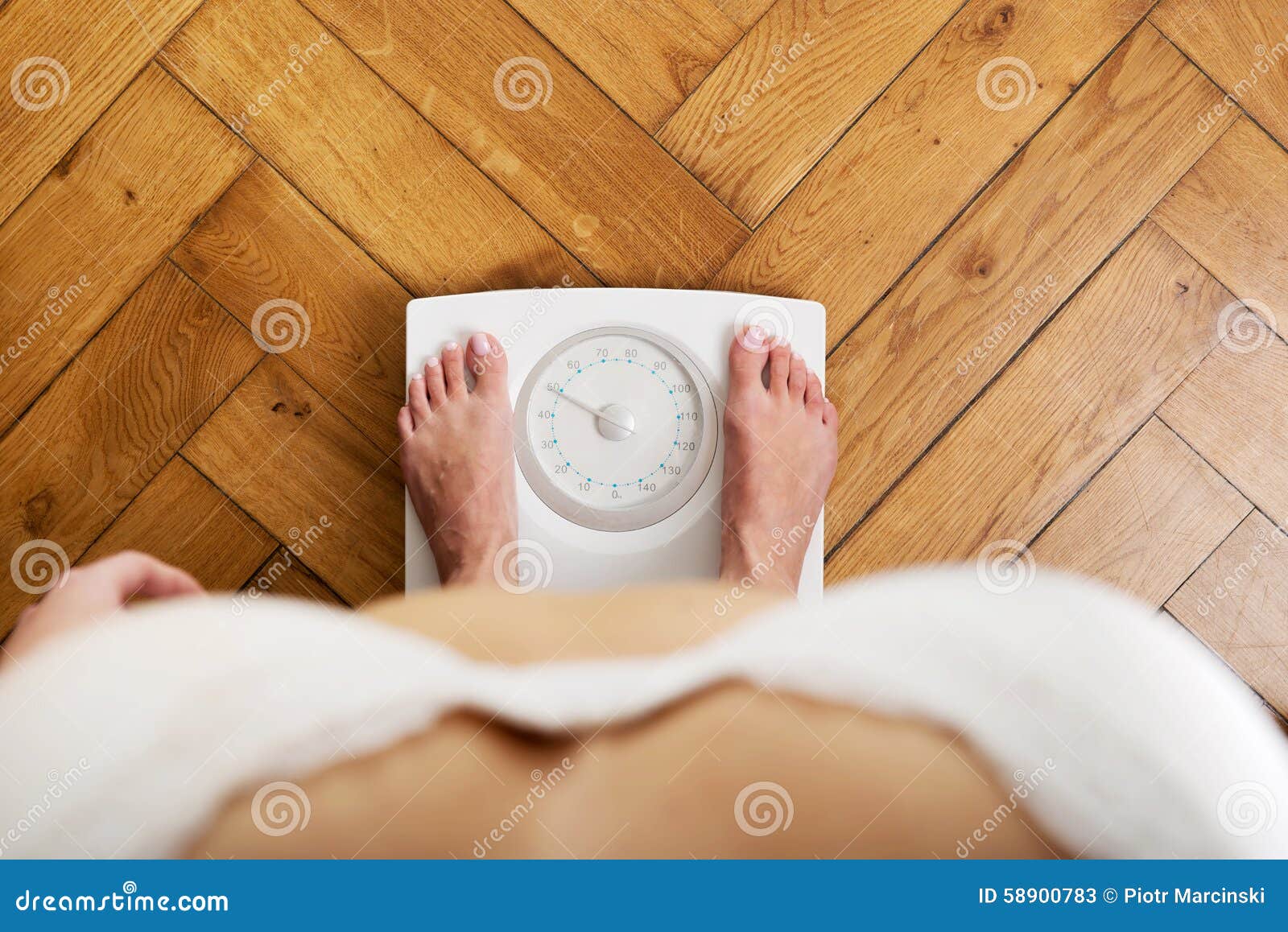 Woman standing on a scale. stock image. Image of body - 58900783