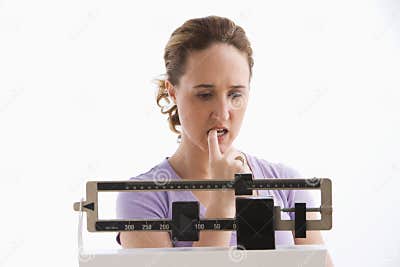 Woman Standing on a Scale - Isolated Stock Photo - Image of house ...