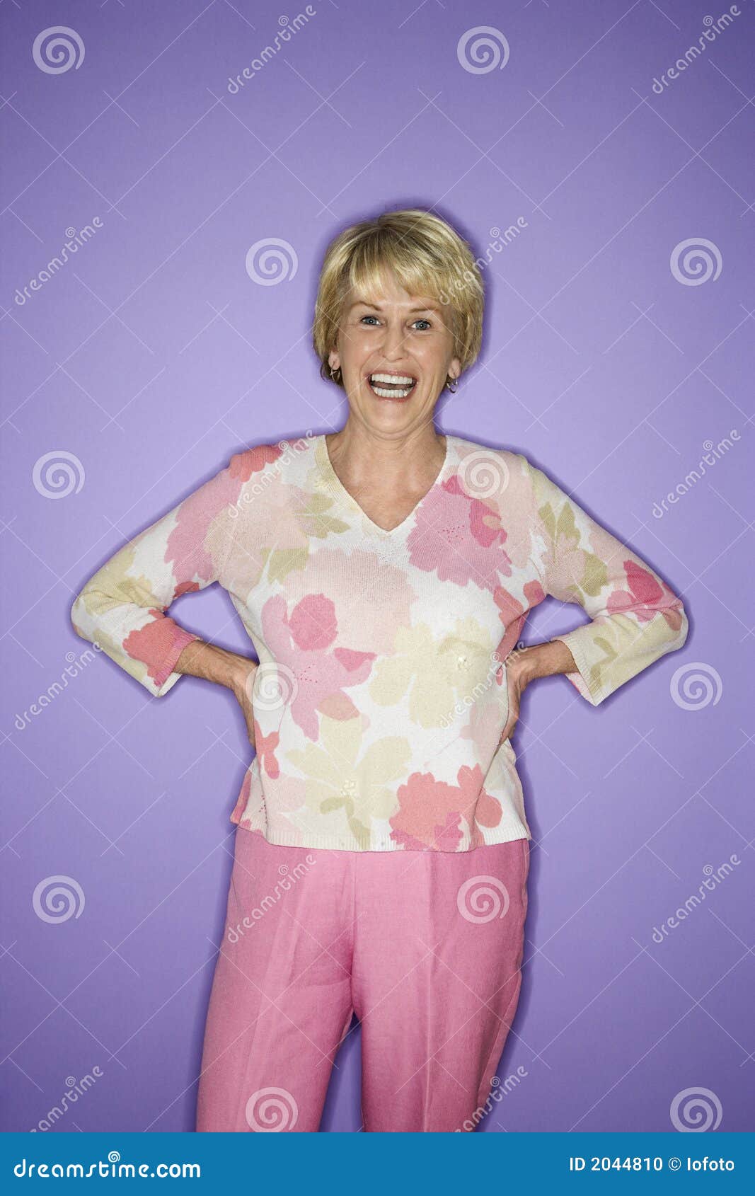 Woman Standing and Smiling. Stock Photo - Image of mature, person: 2044810