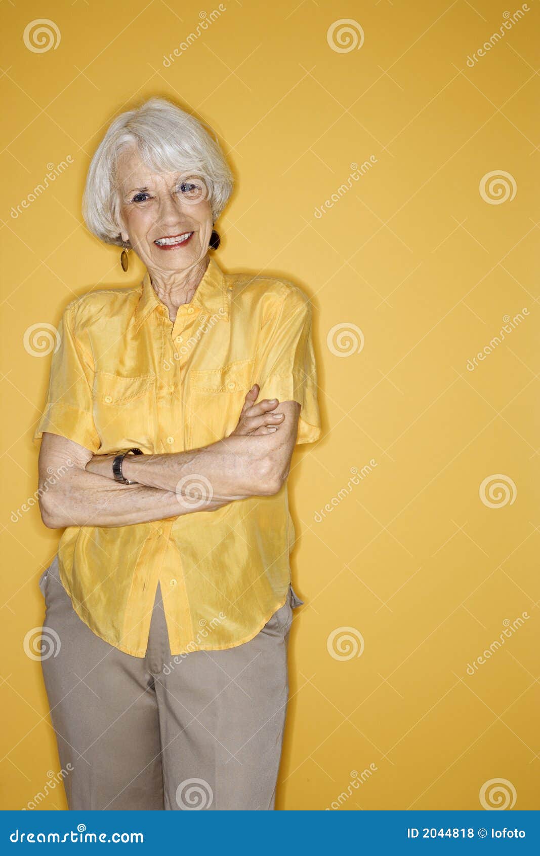Woman standing smiling. stock photo. Image of yellow, hair - 2044818