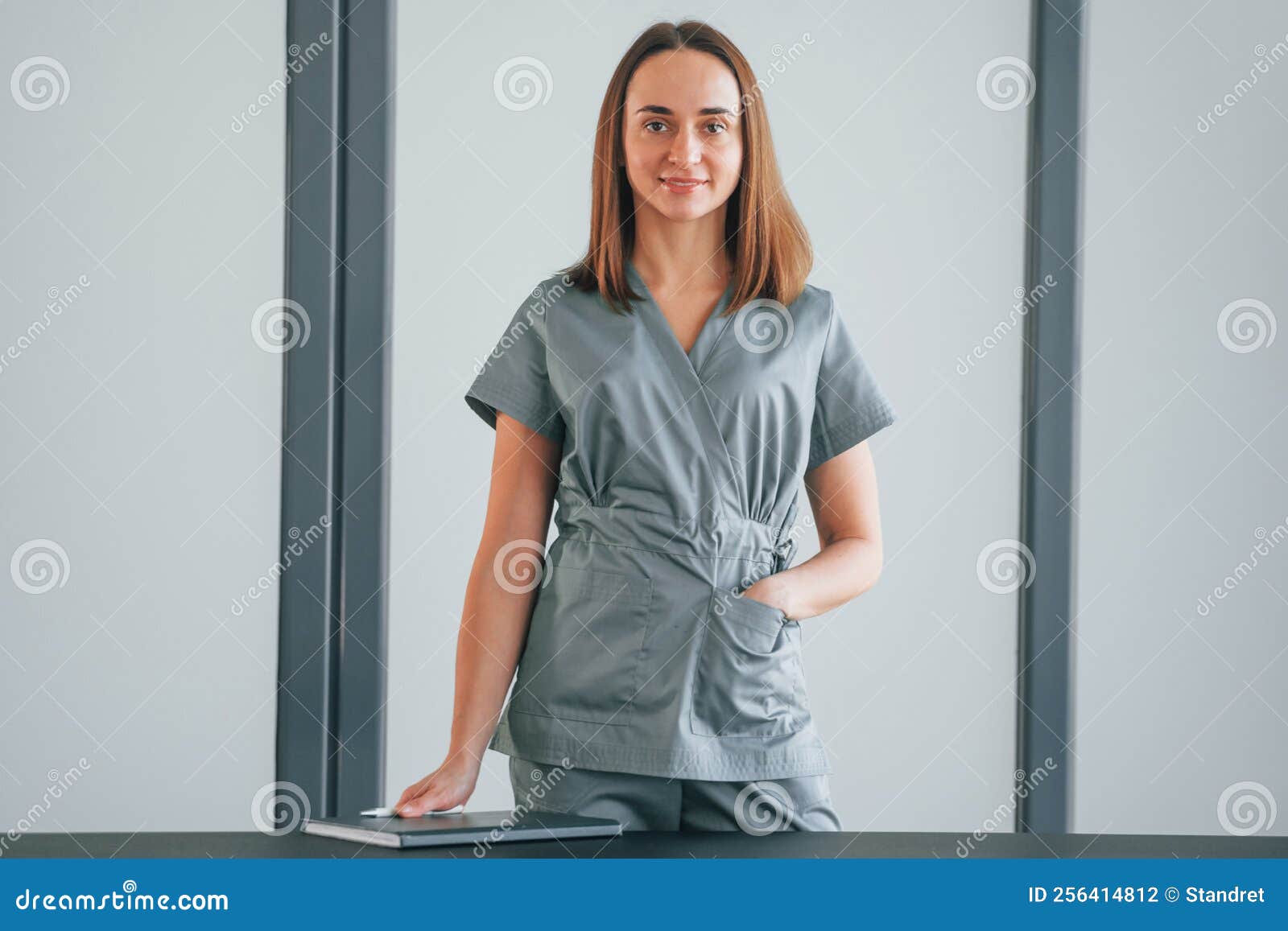 Woman Standing in the Studio Stock Photo - Image of center, lighting ...