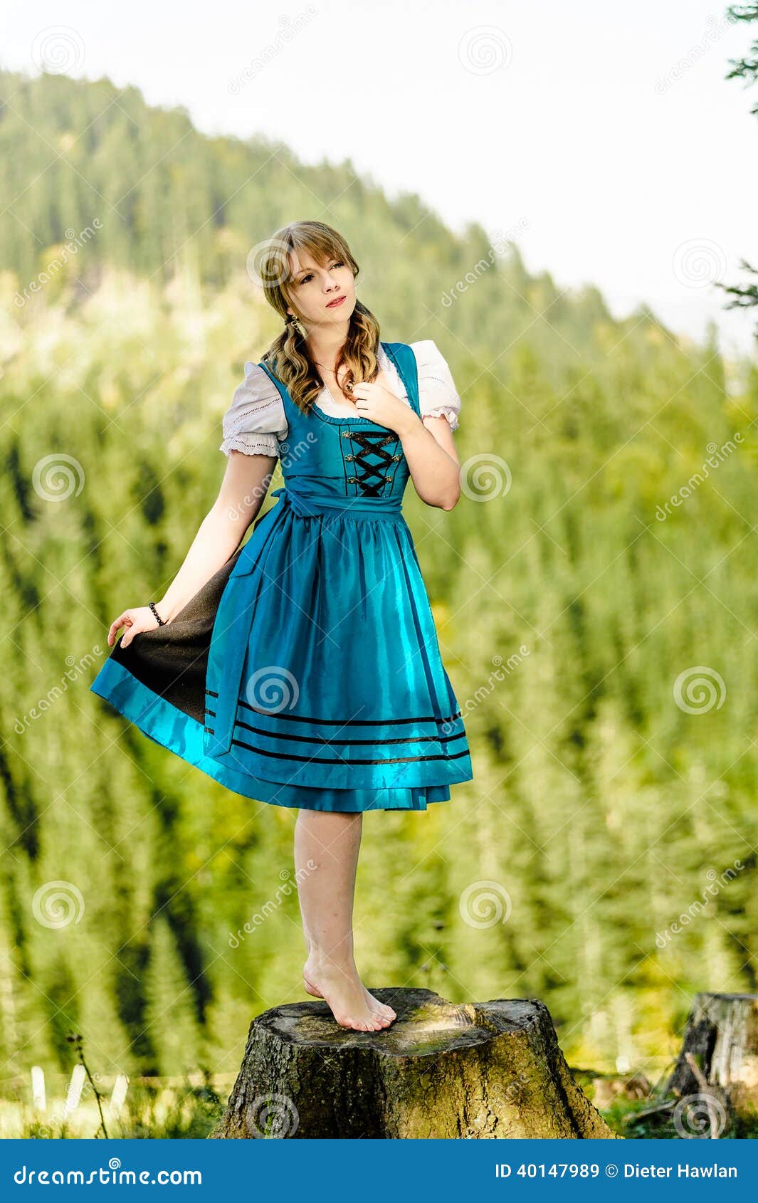 Woman Standing on a Tree Trunk Stock Image - Image of person, alps ...