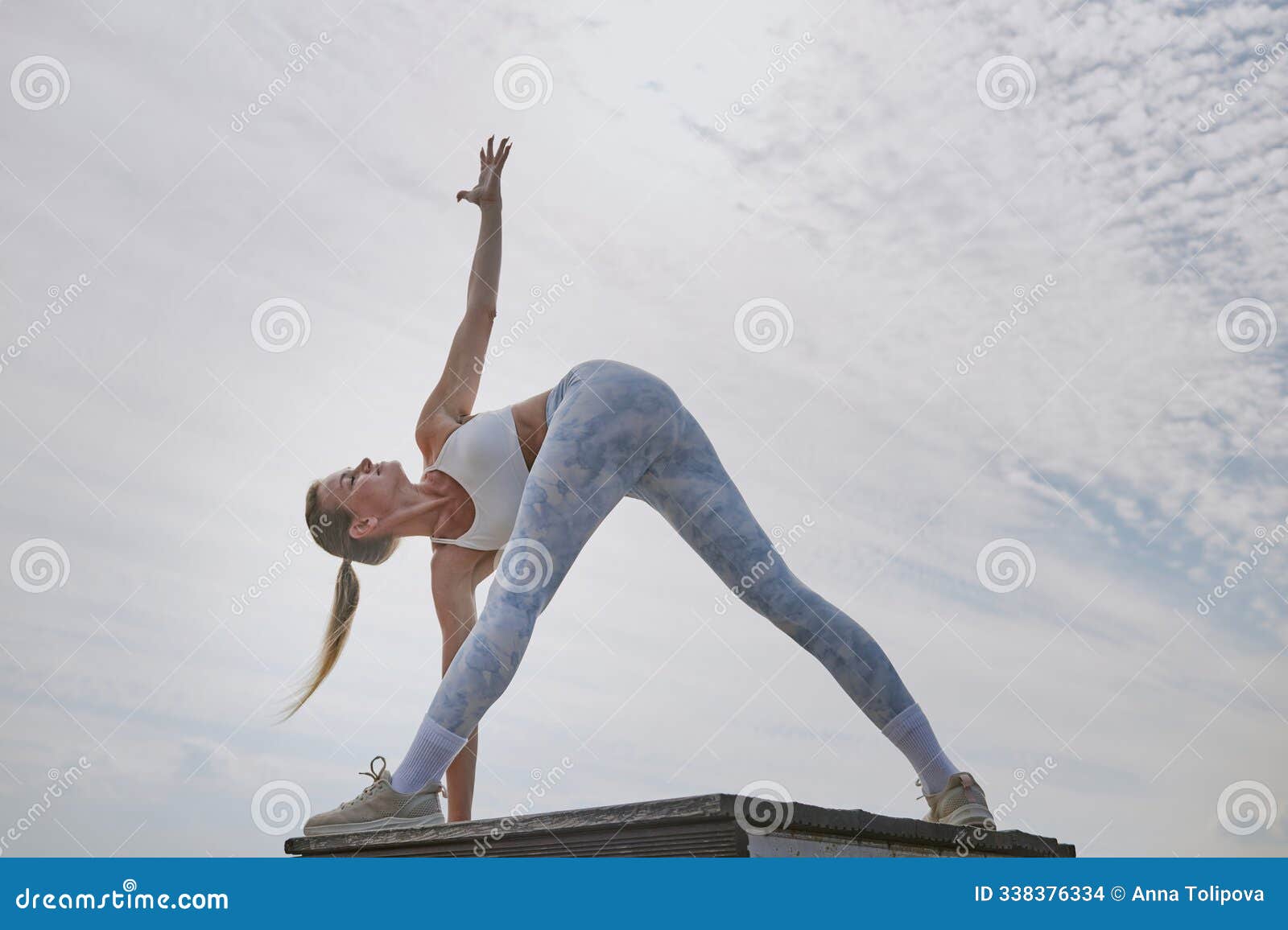 Woman Standing in Triangle Pose Stock Photo - Image of hobby, athletic ...
