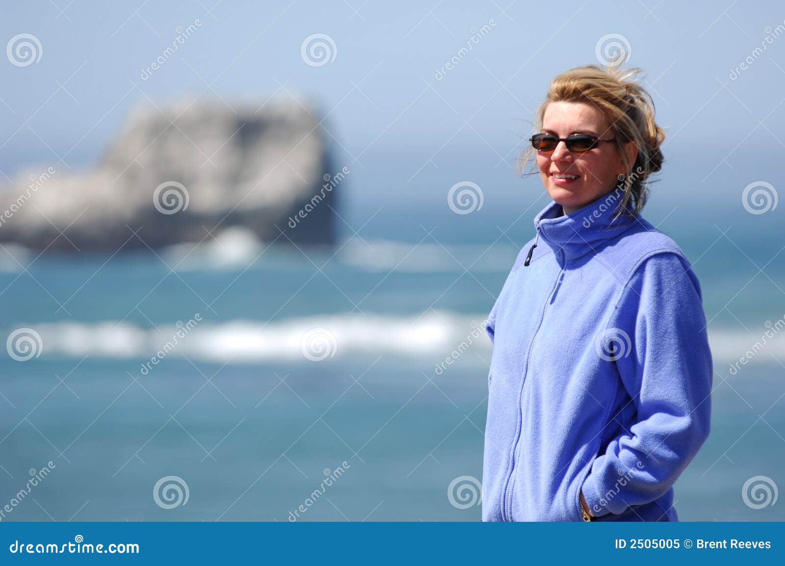 Woman Stands Along Rugged Coas Stock Image - Image of crashing, scenic ...
