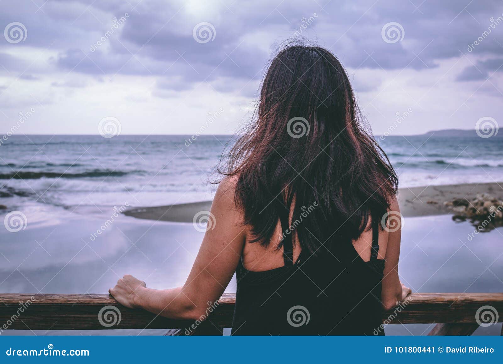 Woman staring at the sea stock image. Image of beautiful - 101800441