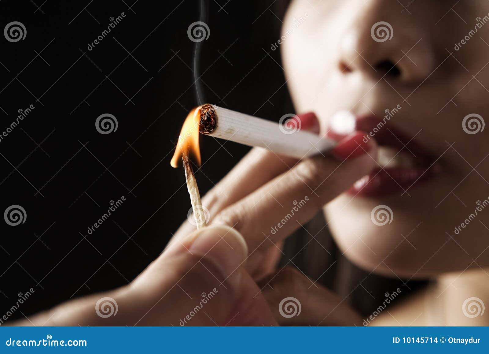 Woman start smoking stock photo. Image of dark, burn - 10145714
