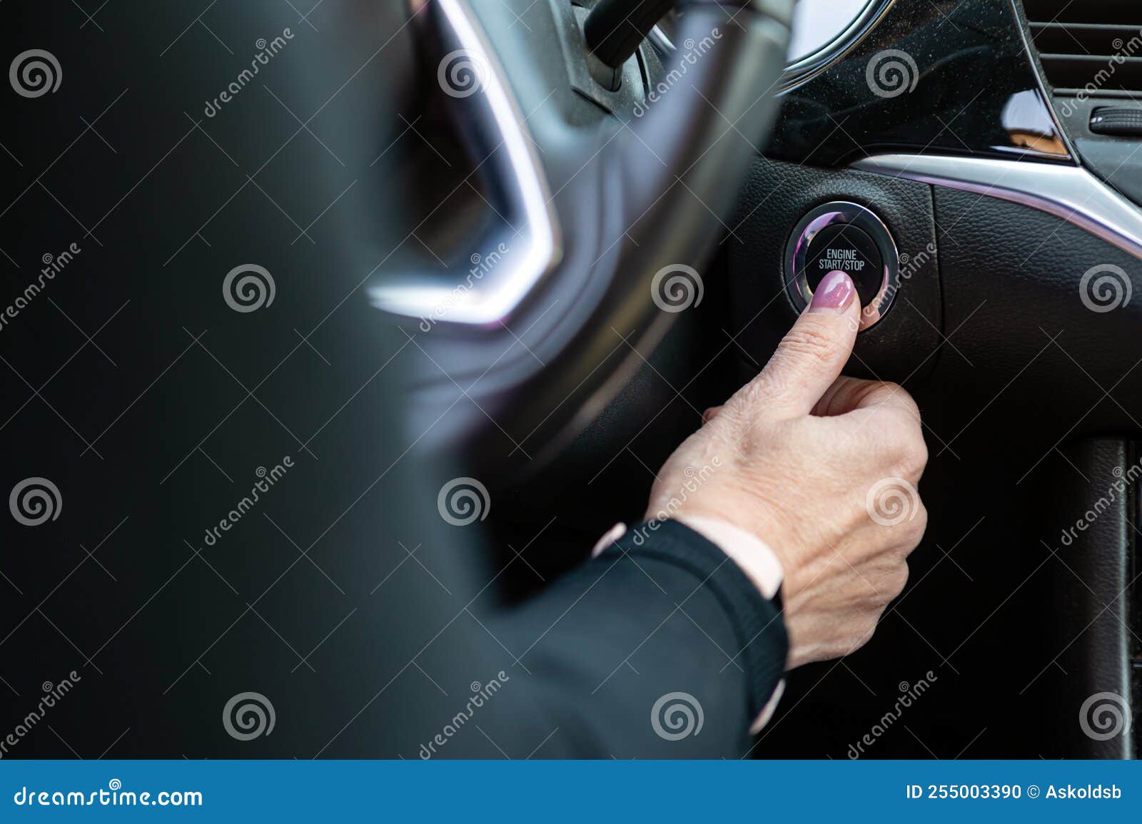 Woman Hand Pushing on Car Engine Start-stop Button. Modern Car Interior ...