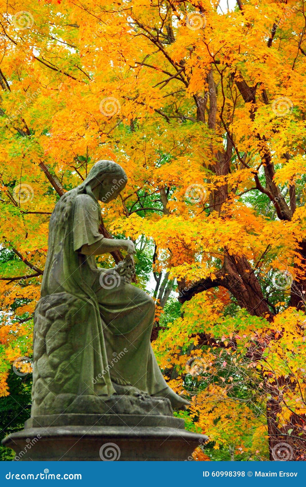Woman Statue in Fall Leaves Stock Photo - Image of background, hiking ...