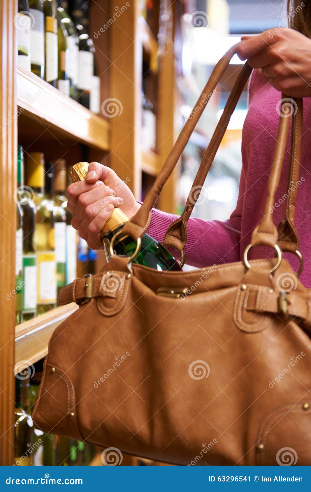 Woman Stealing Bottle of Wine from Shop Stock Image - Image of alcohol ...