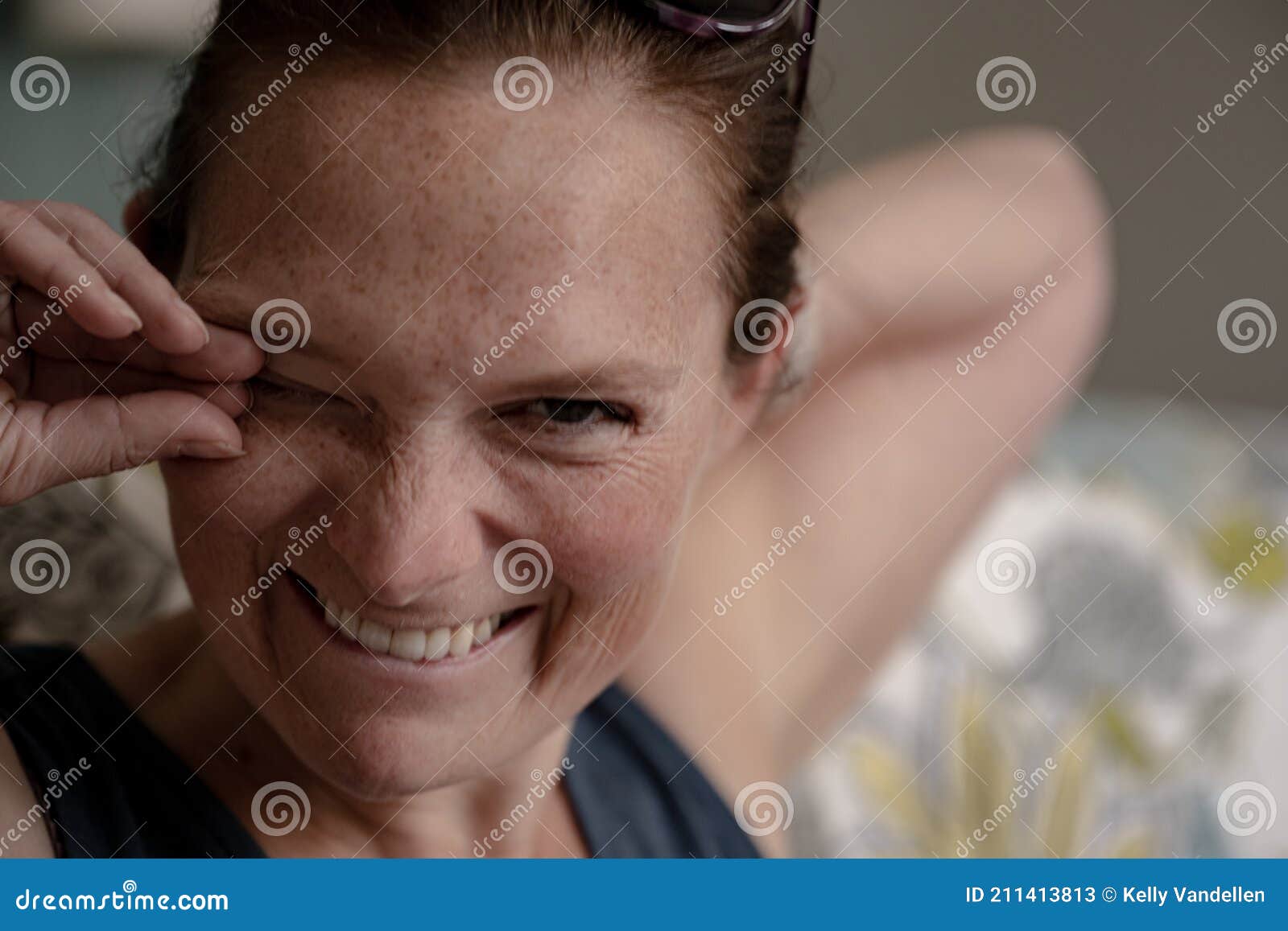 Woman Stretches and Smiles stock image. Image of face - 211413813