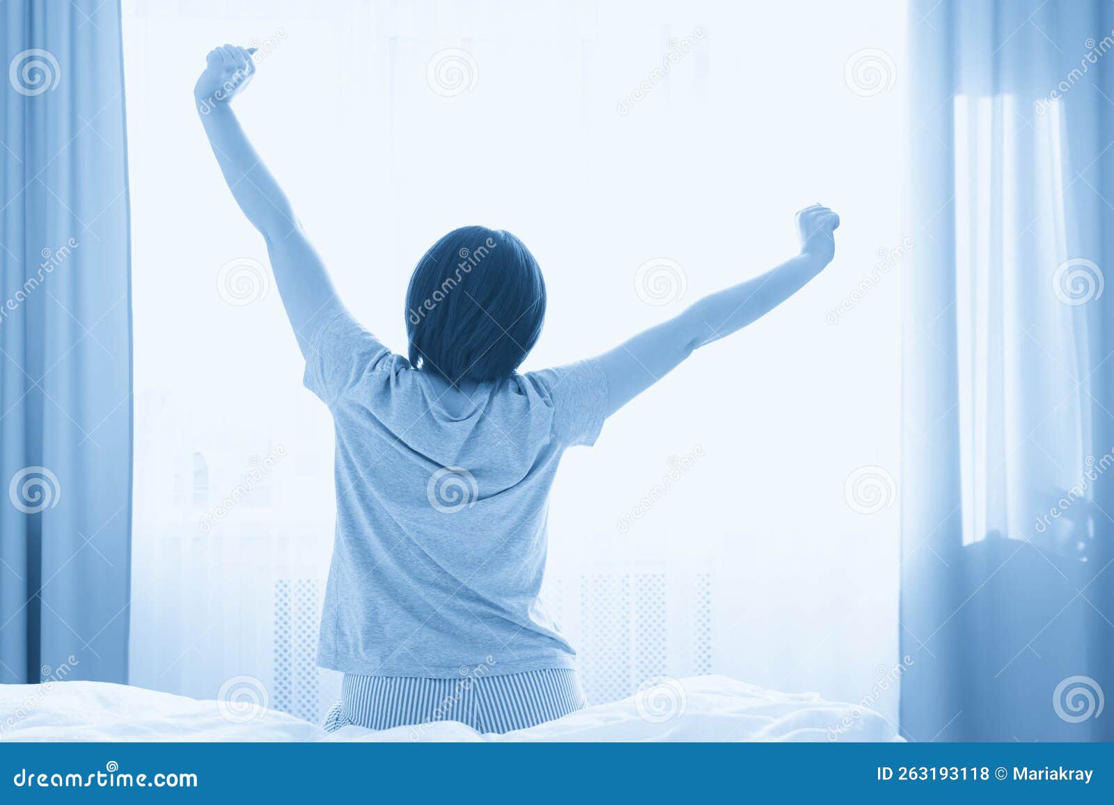 Woman Stretching in Bed after Wake Up, Back View Stock Photo - Image of ...
