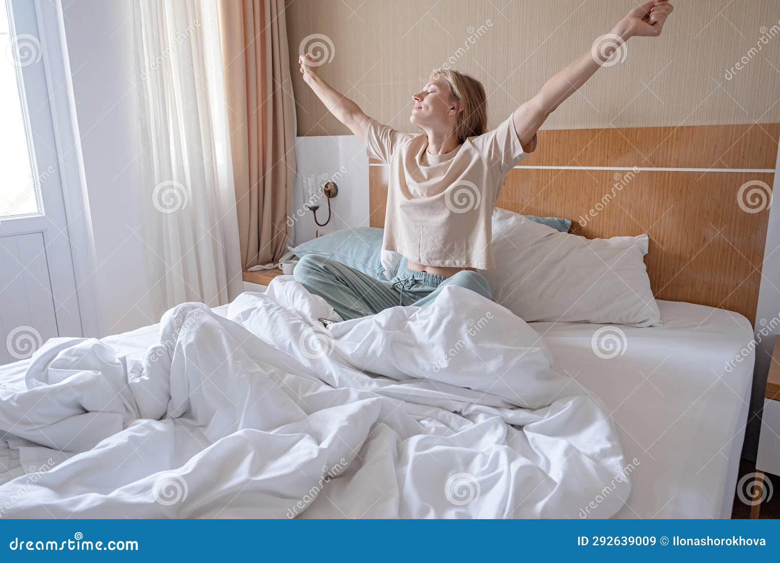 Woman Stretching in Bed after Wake Up Stock Image - Image of caucasian ...