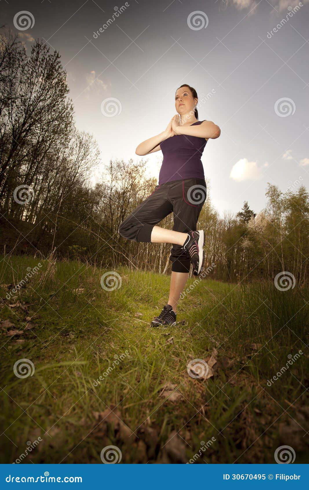 Woman Stretching Out on the Field Stock Image - Image of alone, looking ...