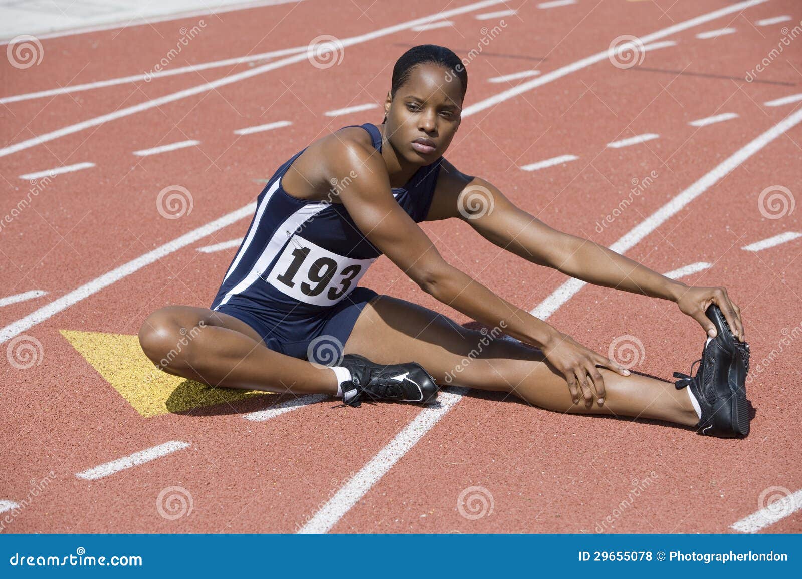Woman Stretching on Race Track Stock Photo - Image of health, length ...