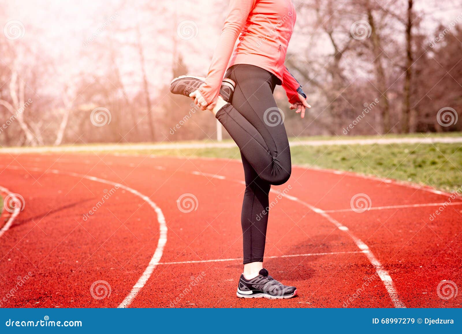Woman Stretching on a Running Track. Stock Image - Image of fitness ...