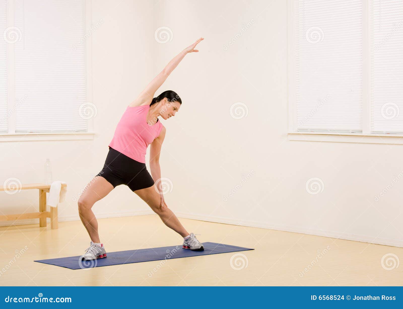 Woman Stretching on Yoga Mat Stock Photo - Image of caucasian, european ...