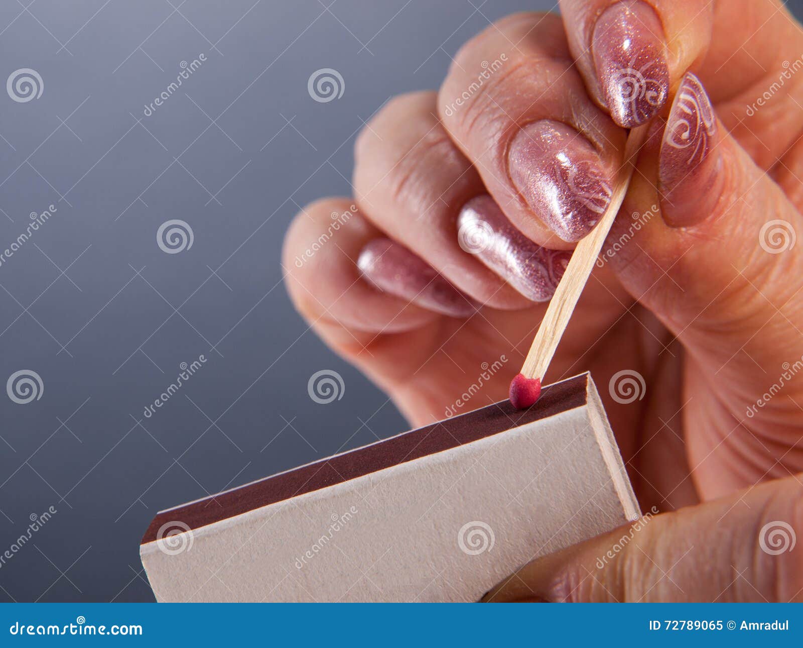 Woman Striking a Match Close Up Stock Image - Image of lights, holding ...
