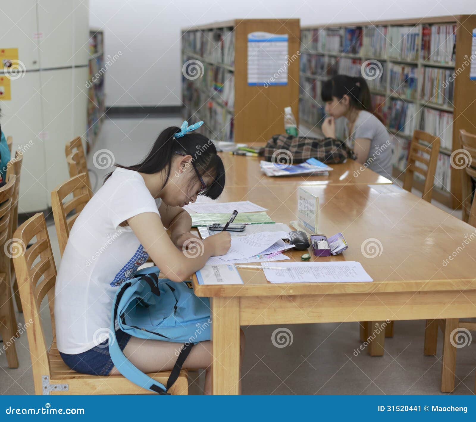 Woman Studying Carefully in the Library Editorial Photo - Image of ...