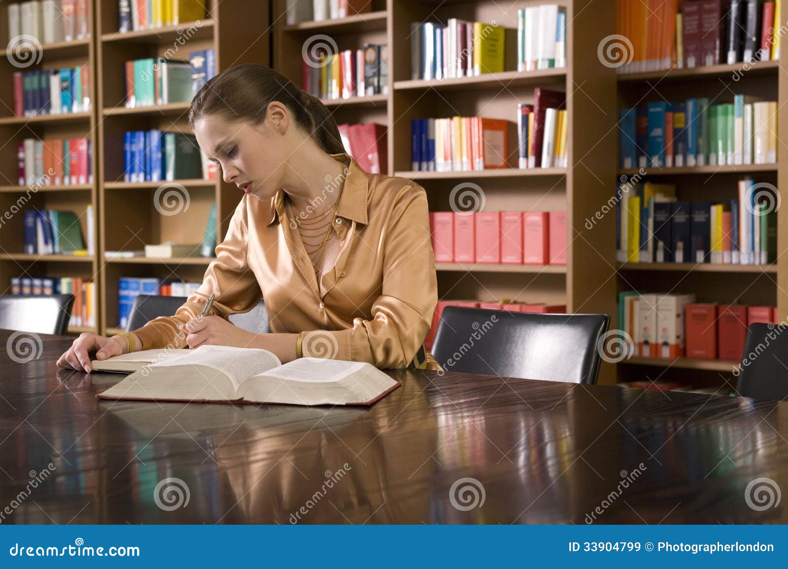 Woman Studying at Desk in Library Stock Image - Image of pretty ...