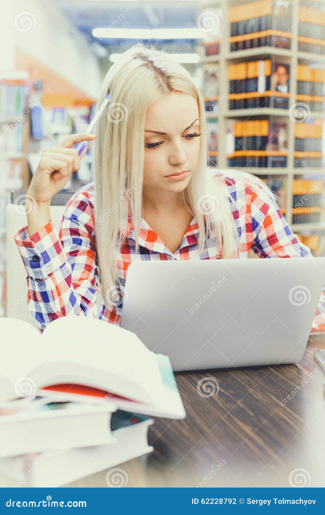 Woman studying in library stock photo. Image of happy - 62228792