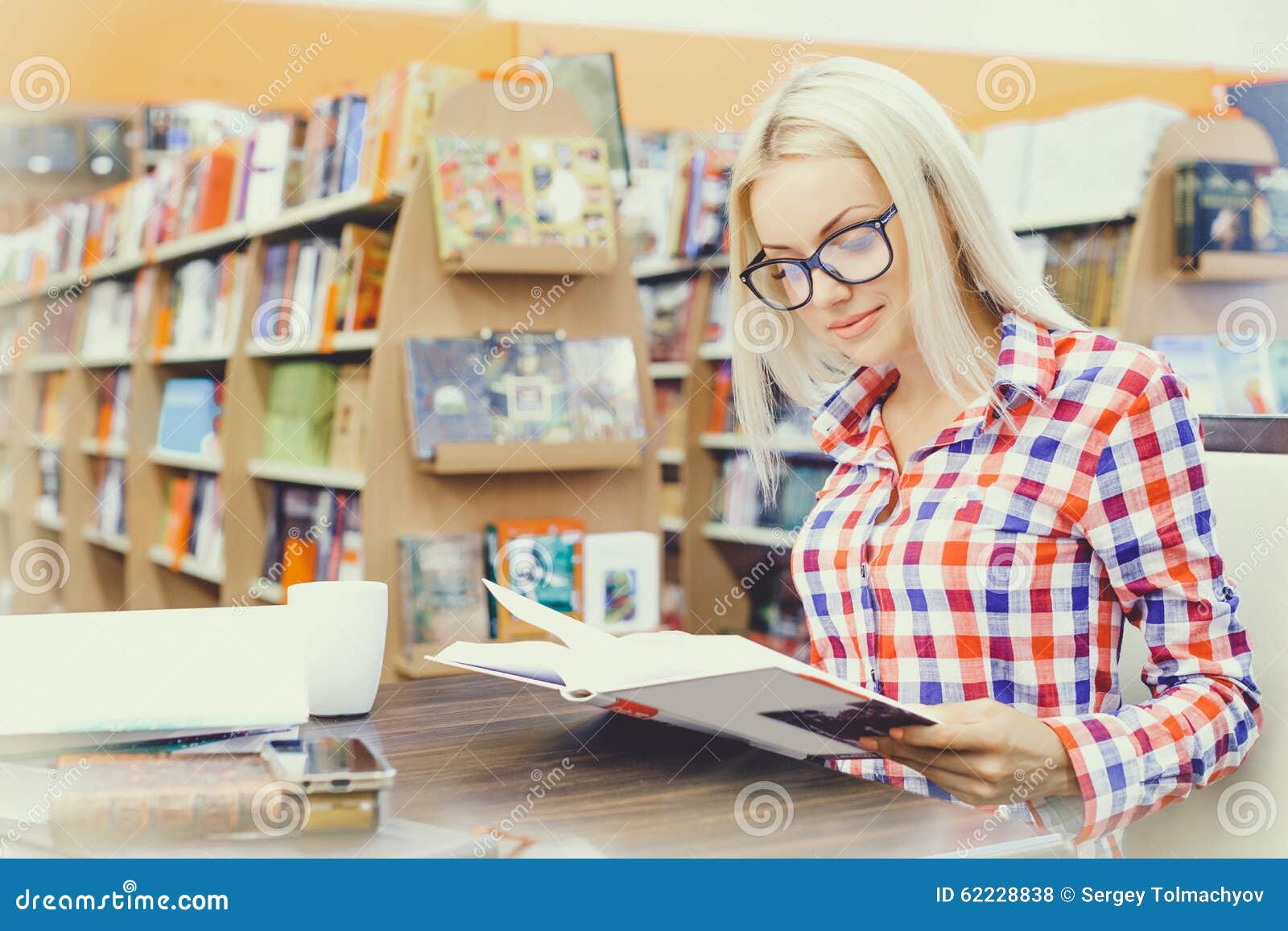 Woman studying in library stock photo. Image of blonde - 62228838