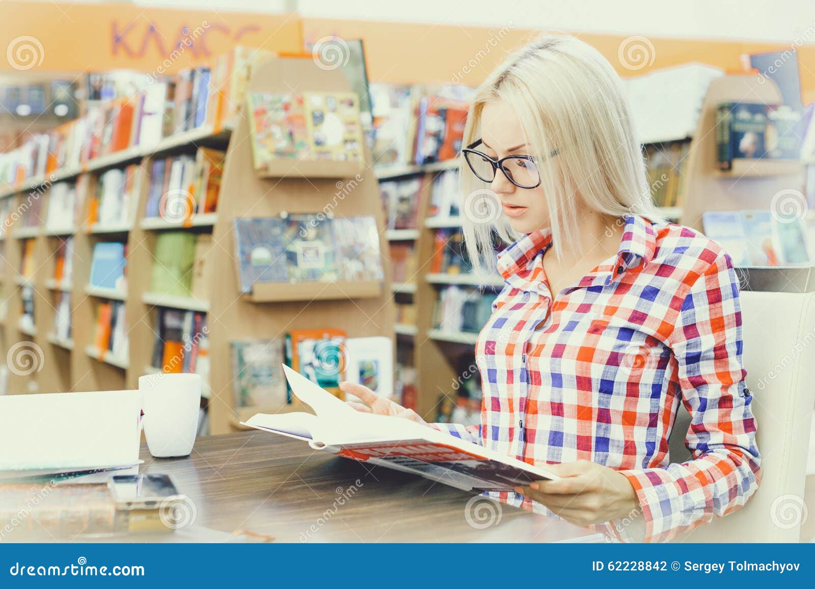 Woman studying in library stock photo. Image of sitting - 62228842