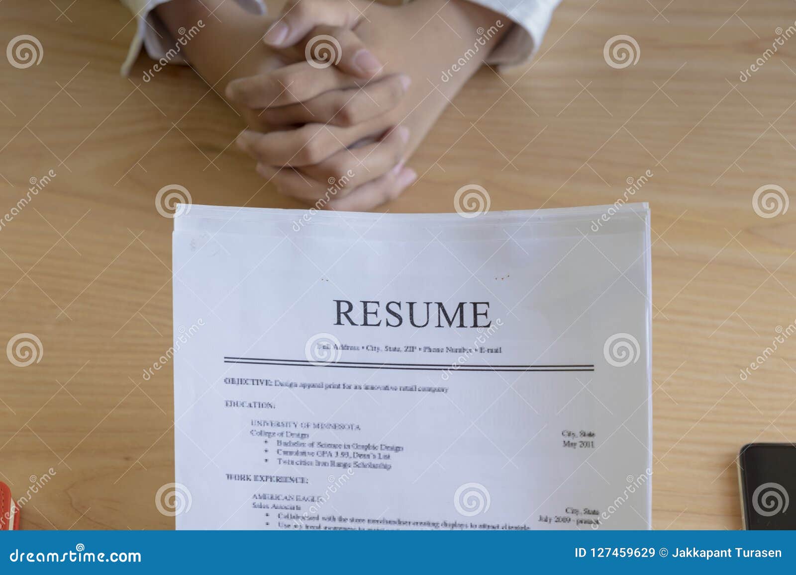 Woman Submits Job Application, Interviewer Reading a Resume. Stock ...