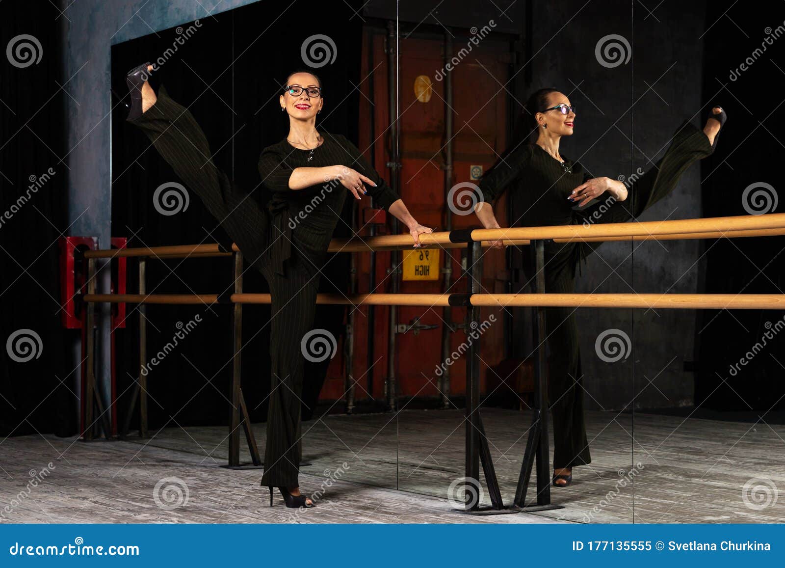 Woman in Suit Training at Ballet Machine Stock Image - Image of long ...