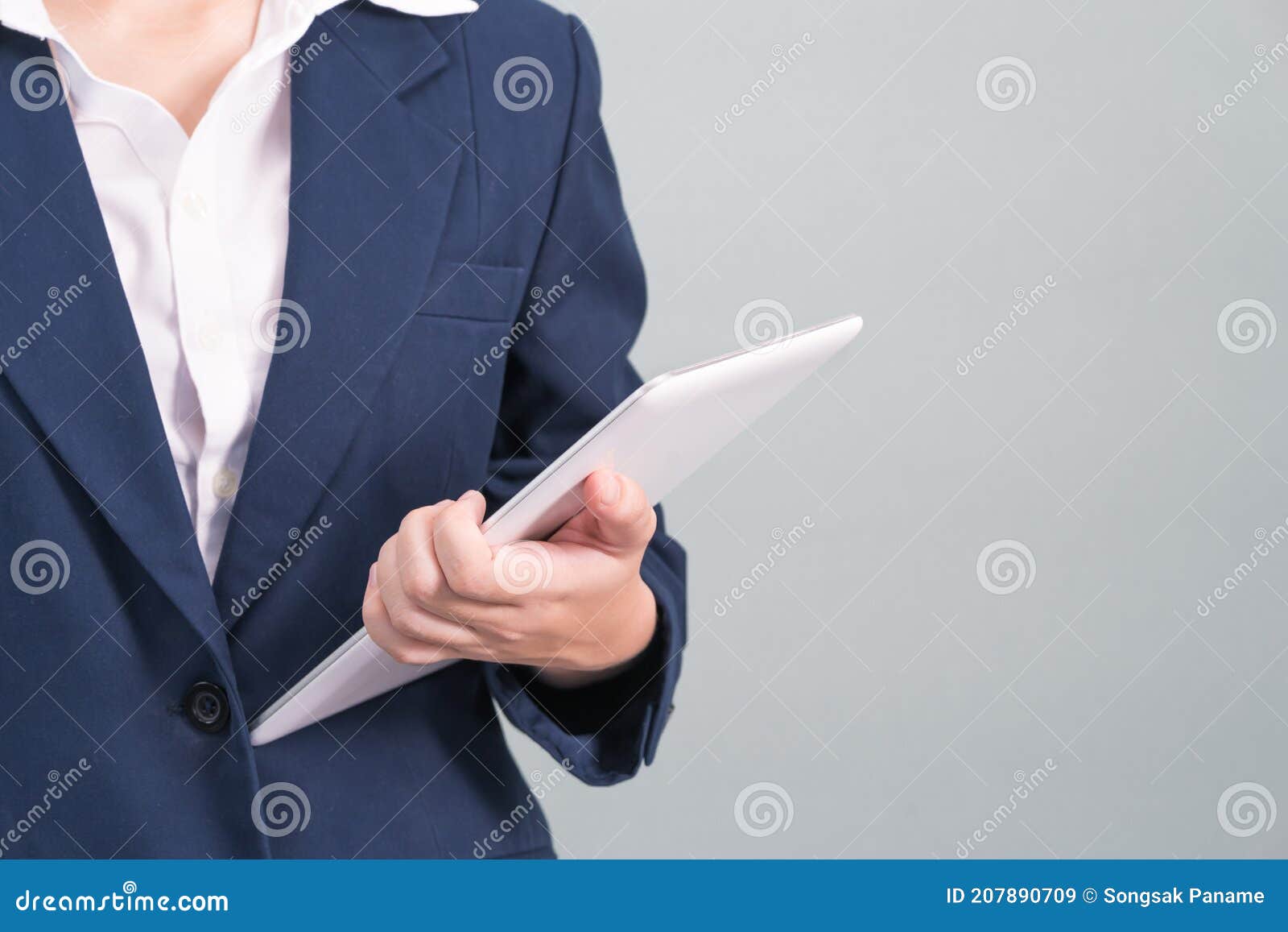 Woman in Suit Using Computer Digital Tablet on Gray Stock Image - Image ...