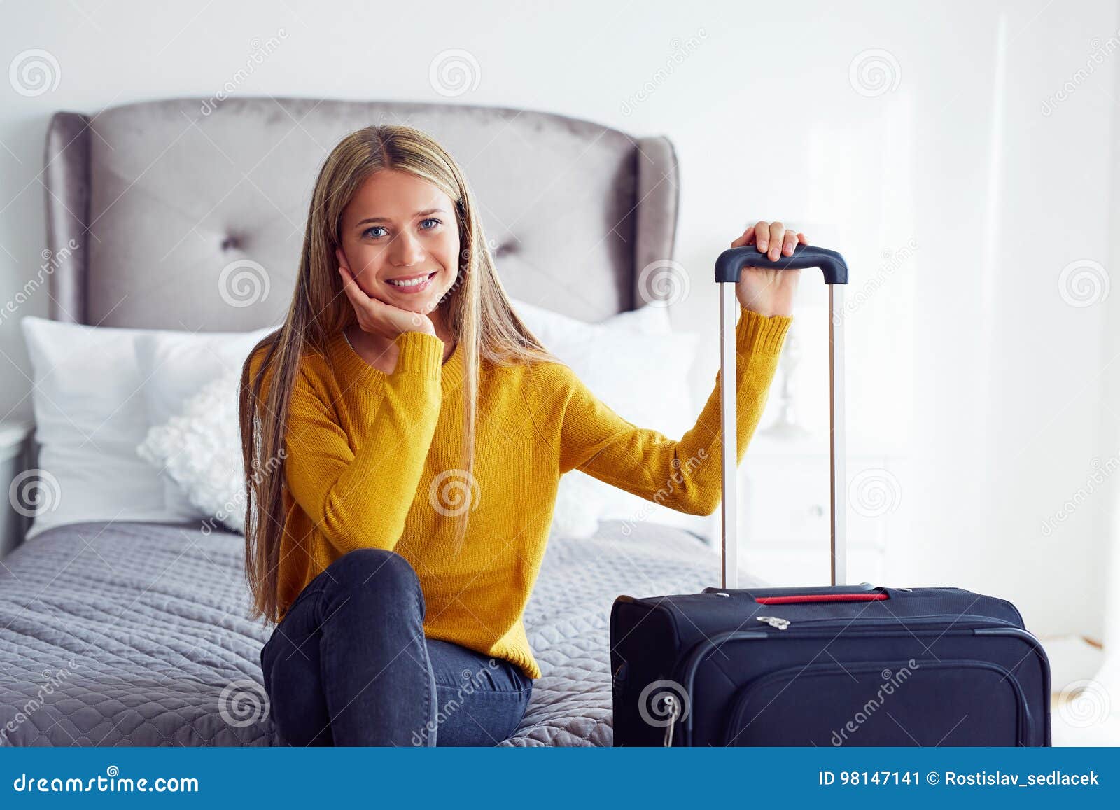 Woman with Suitcase Sitting on Bed Stock Image - Image of beautiful ...
