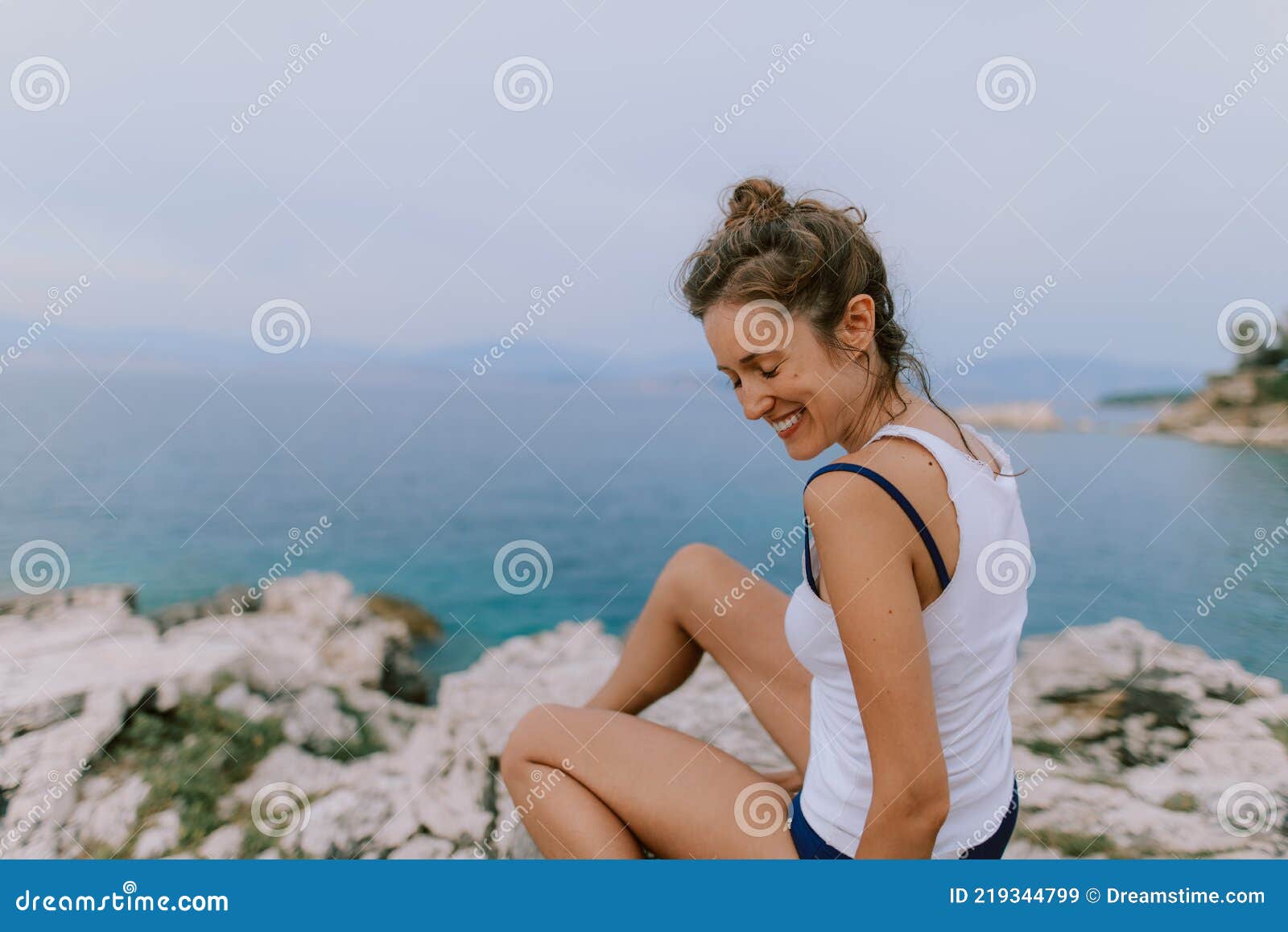 Woman Sunbathing and Posing at the Beach at the Ocean Stock Image ...