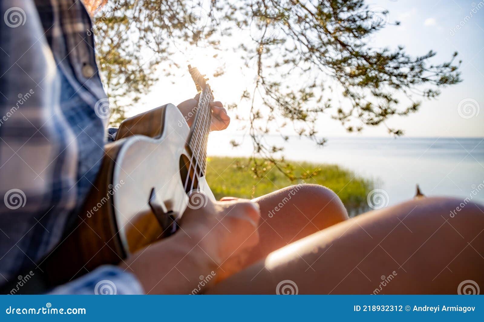 Woman at Sunset Playing the Ukulele Stock Photo - Image of freedom ...