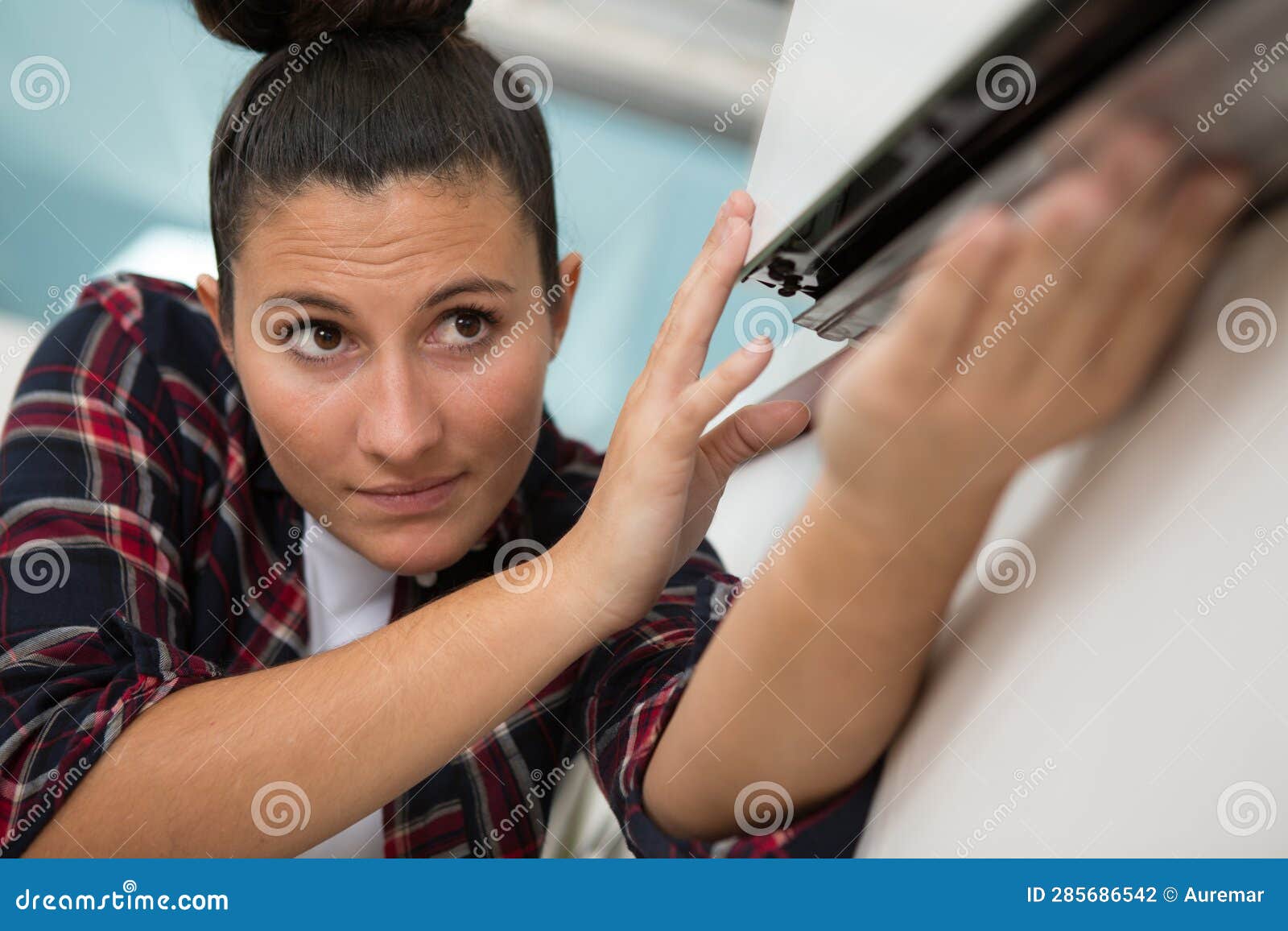 Woman Supporting Electrical Appliance Stock Photo - Image of ...
