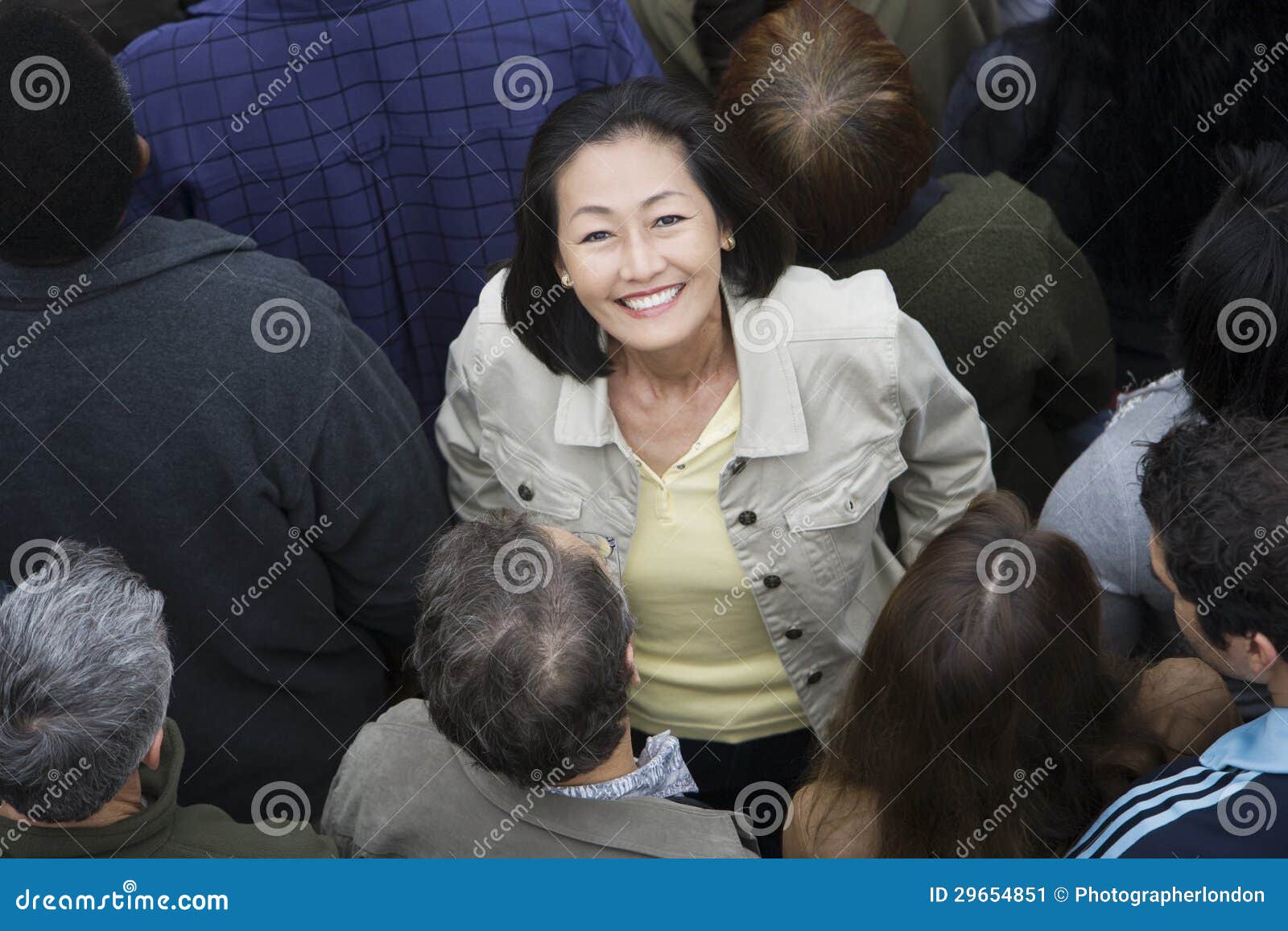 Woman Surrounded by People stock image. Image of people - 29654851