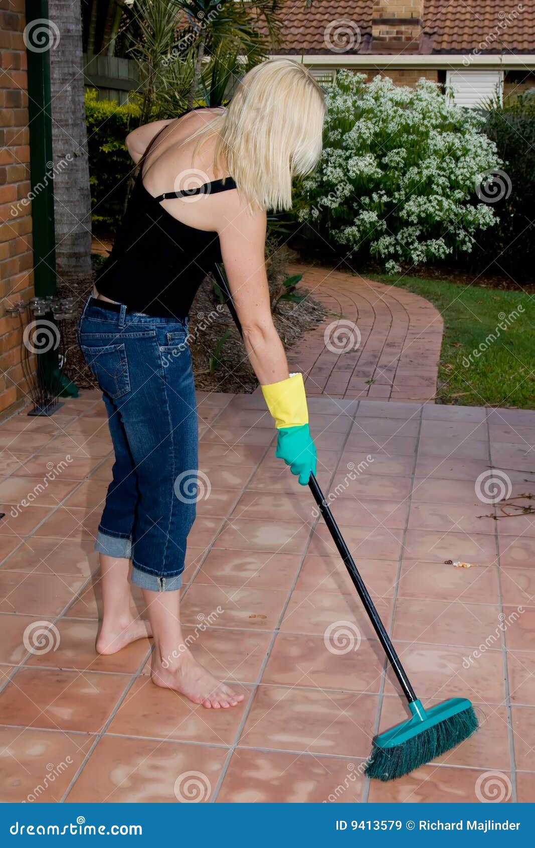 Woman sweeping tiled floor stock image. Image of dirty - 9413579