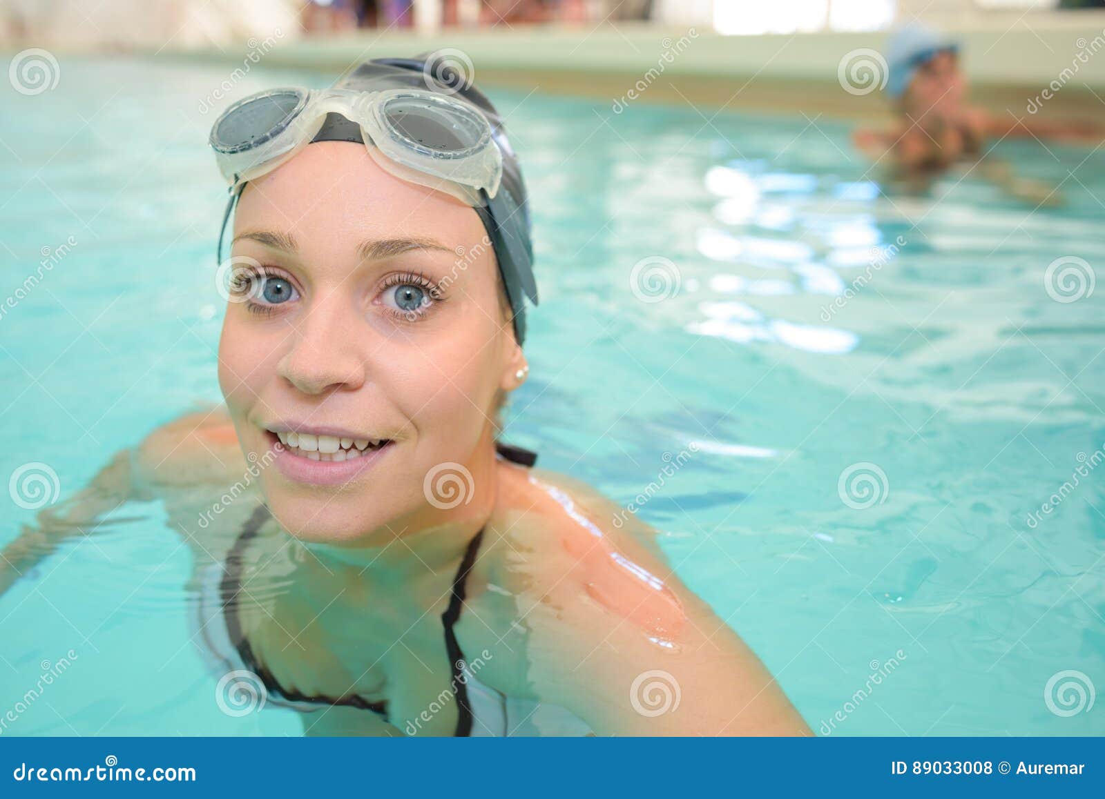 Woman swimming in pool stock photo. Image of competition - 89033008