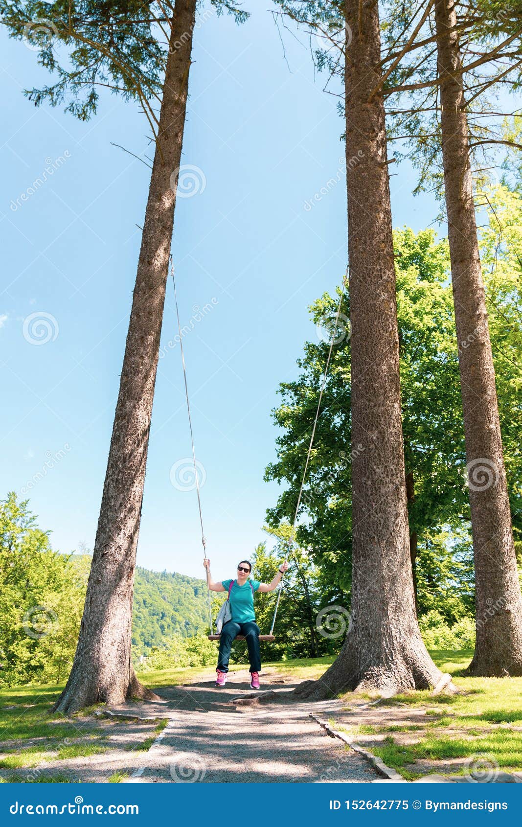 Woman Swing between the Trees Stock Image - Image of laying, nature ...
