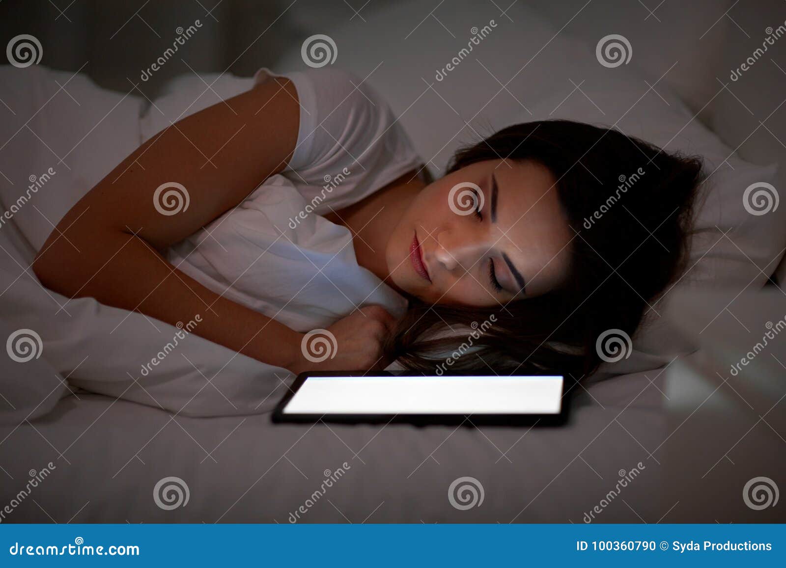 Woman with Tablet Pc Sleeping in Bed at Night Stock Photo - Image of ...