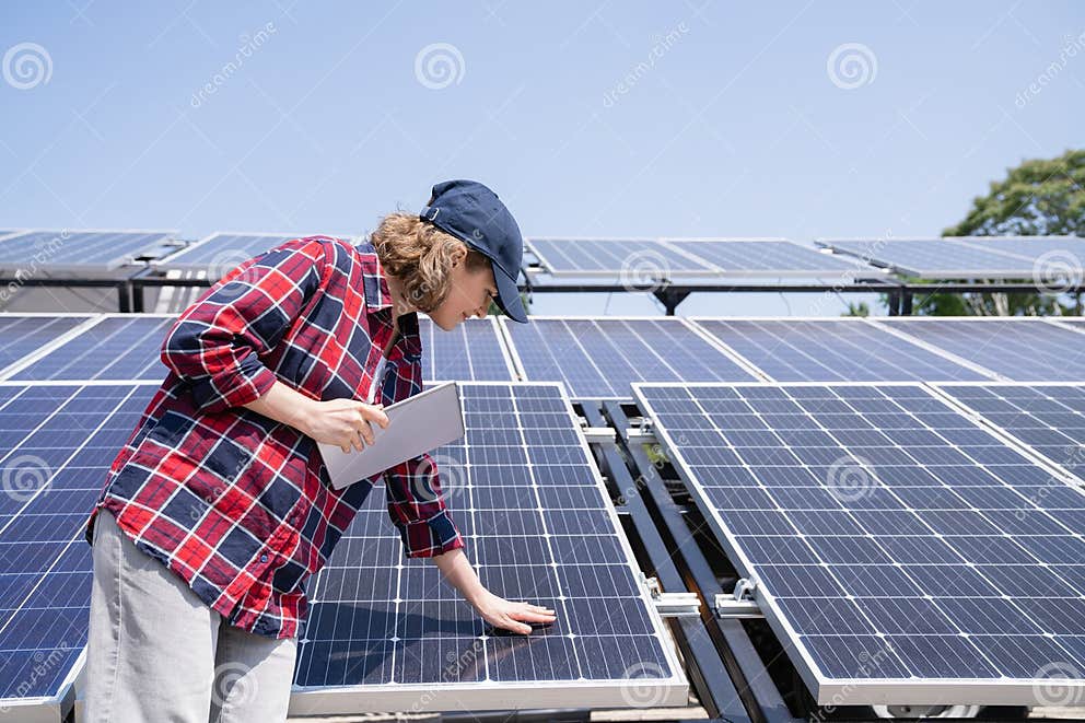 Woman with Tablet Touching Solar Panel Stock Photo - Image of ...