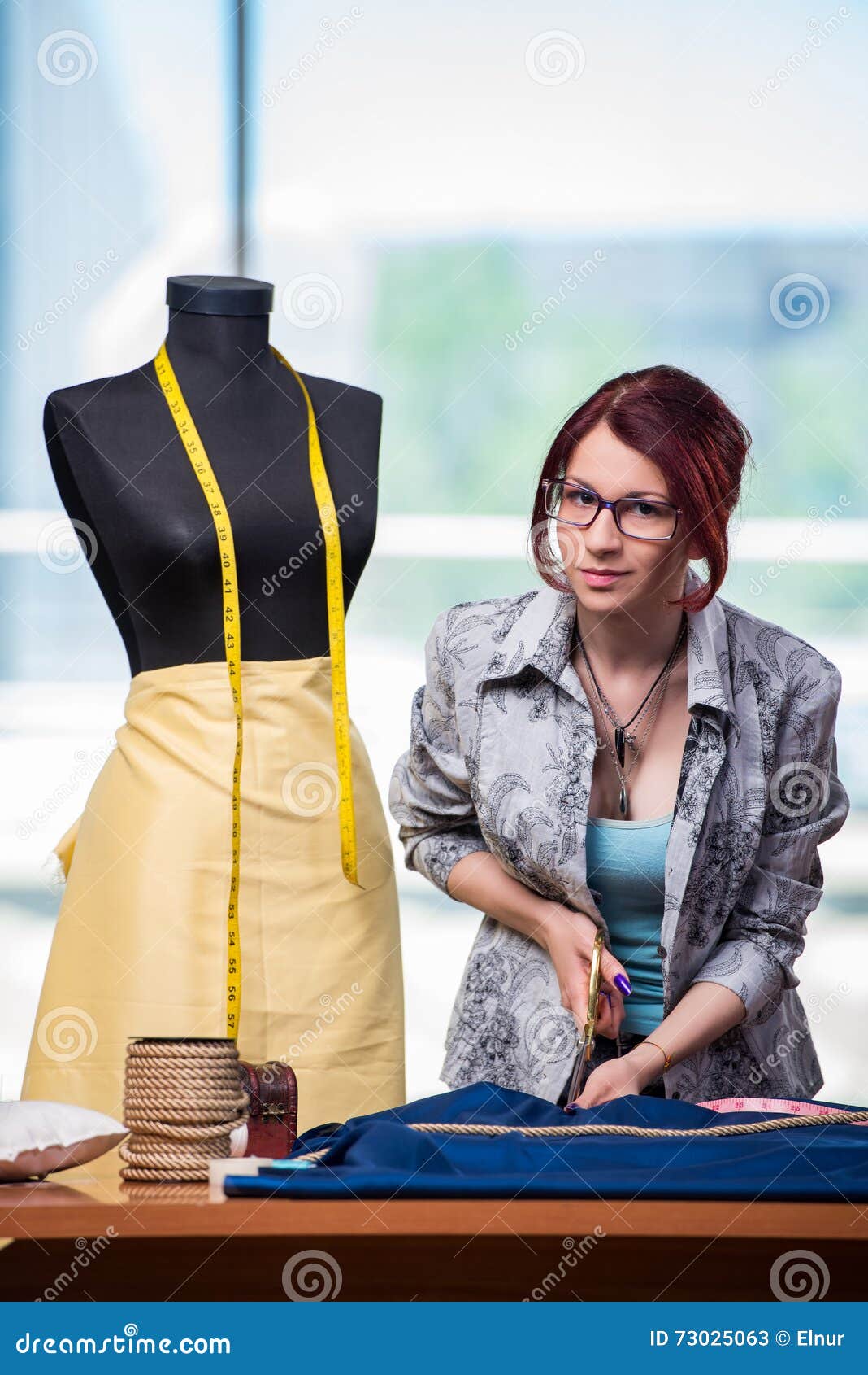 The Woman Tailor Working at Her Desk Stock Image - Image of garment ...