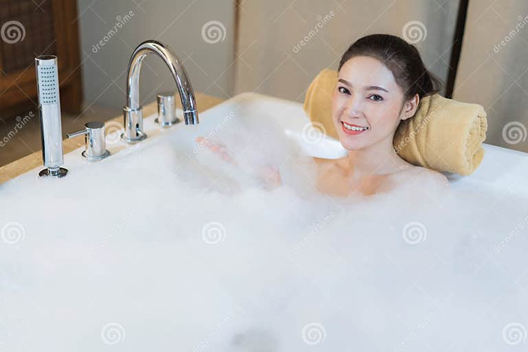 Woman Takes Bubble Bath And Playing In Bathtub Stock Image Image Of