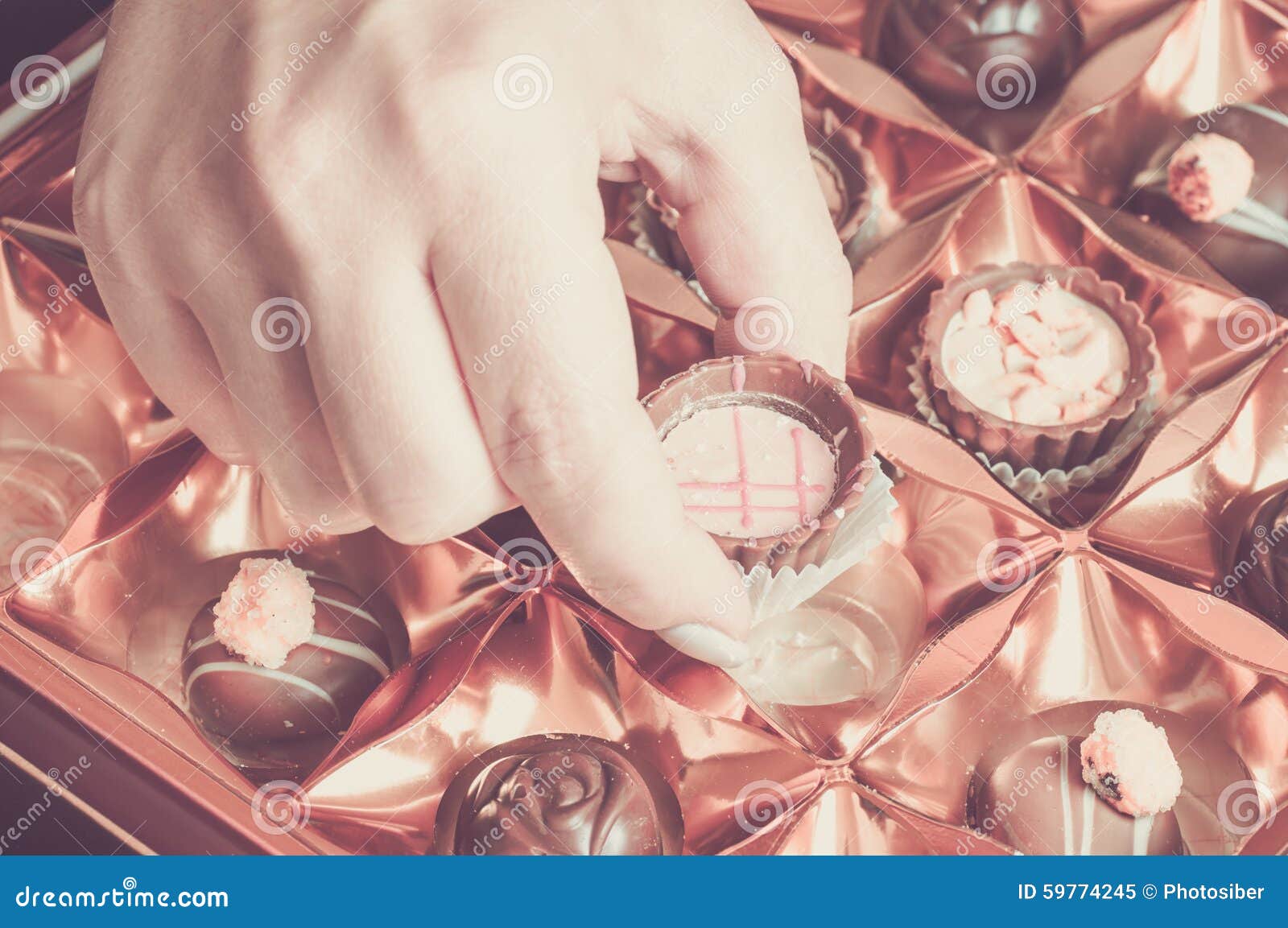 Woman Takes a Chocolate from the Box Stock Image - Image of click ...
