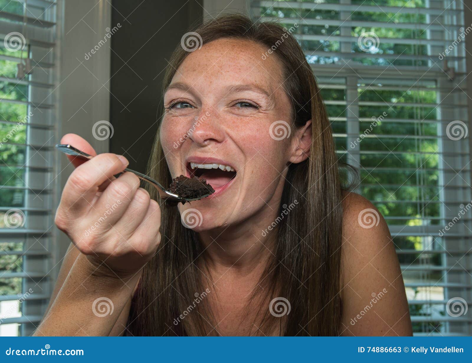 Woman Taking Bite of Chocolate Cake Stock Image - Image of dessert ...