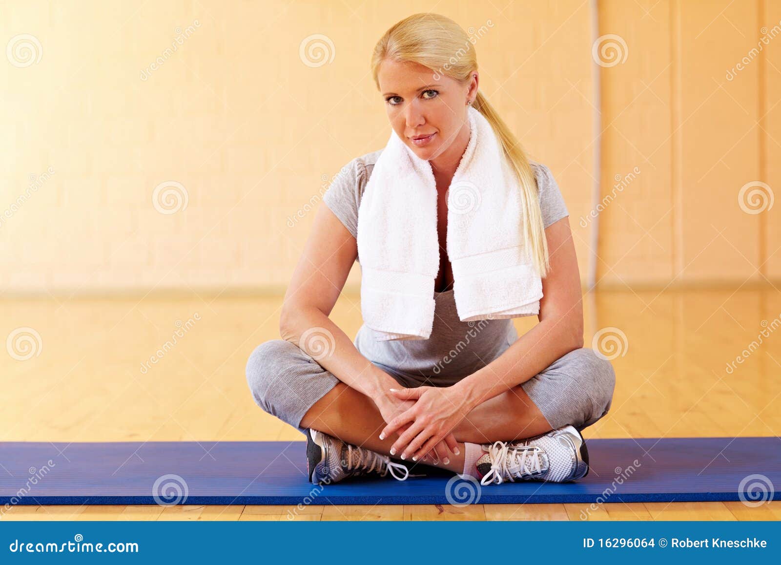 Woman taking break in gym stock photo. Image of relaxation - 16296064