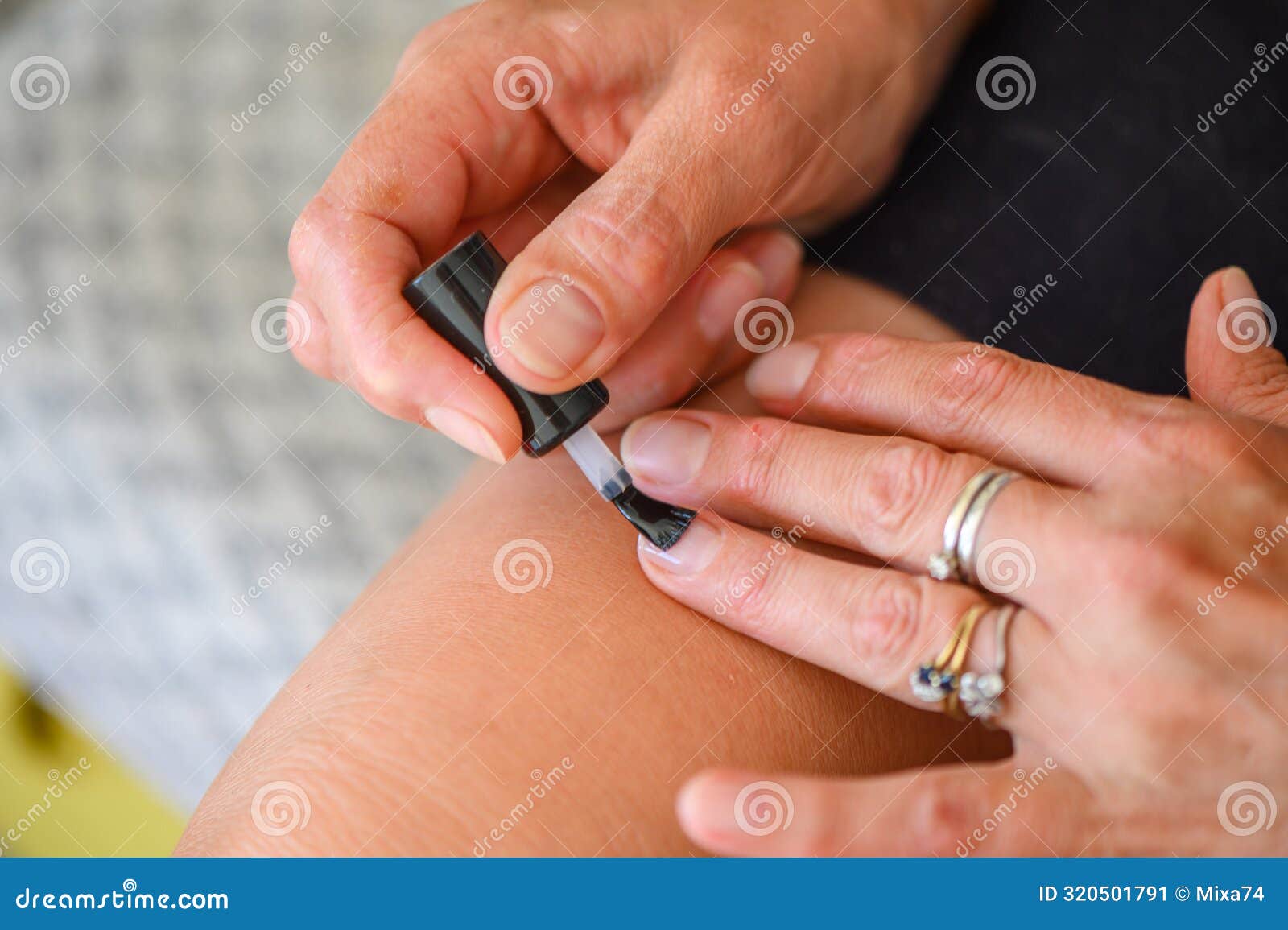 Woman Taking Care of Her Nails 1 Stock Image - Image of covering ...