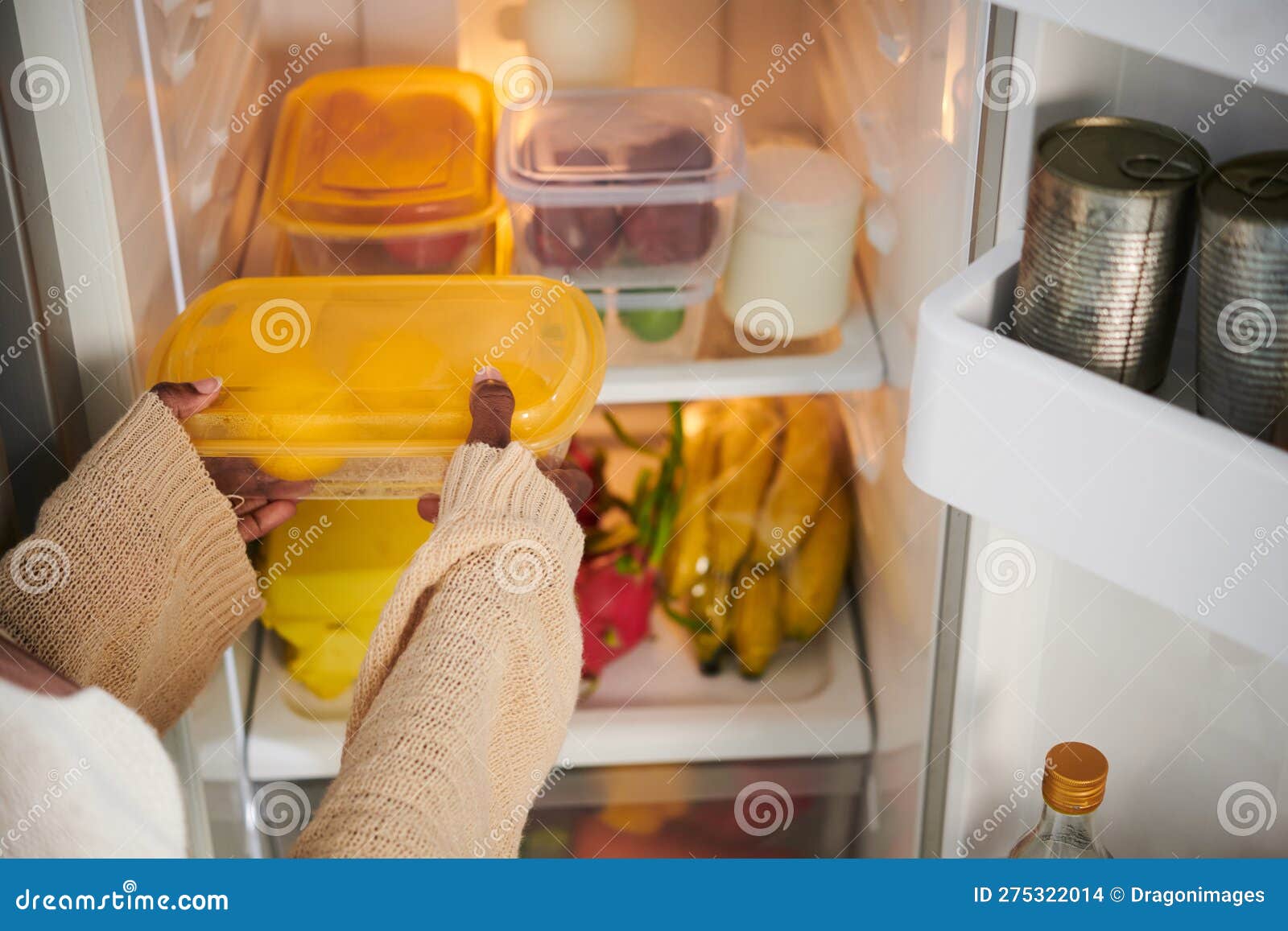 Woman Taking Container from Fridge Stock Photo - Image of retail ...