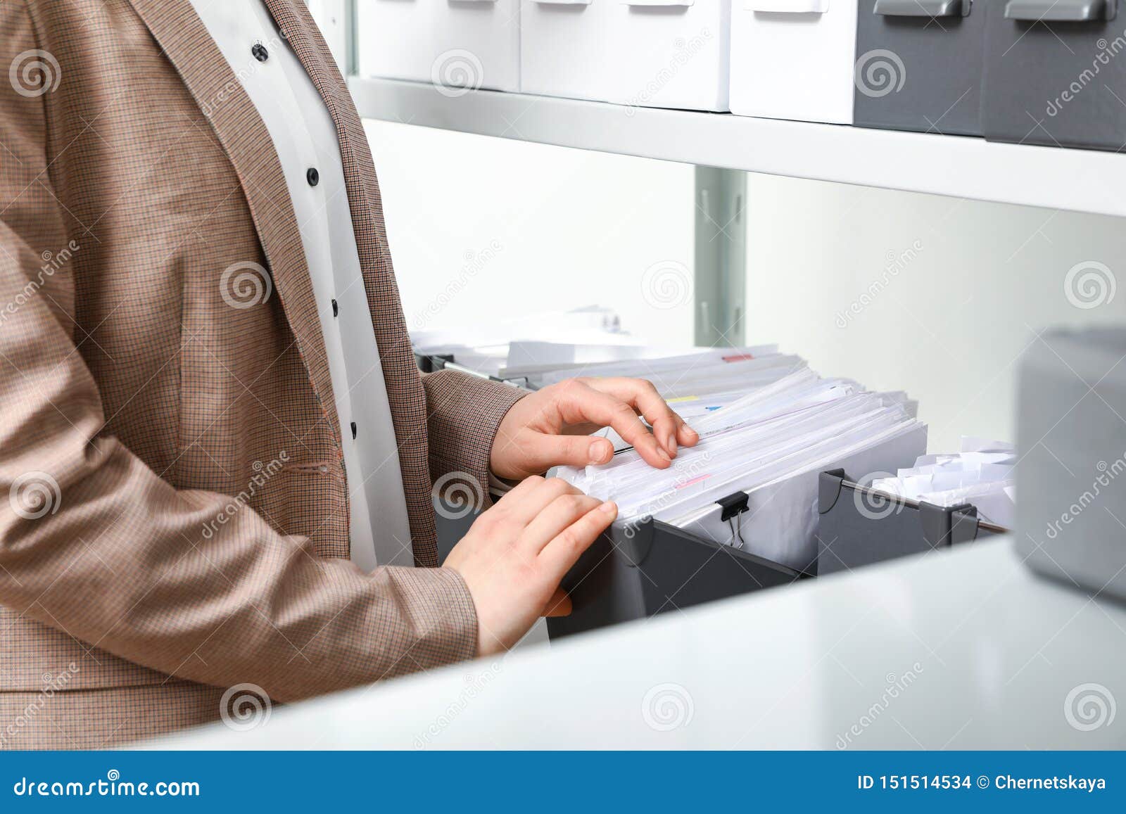 Woman Taking Documents from Folder in Archive Stock Photo - Image of ...